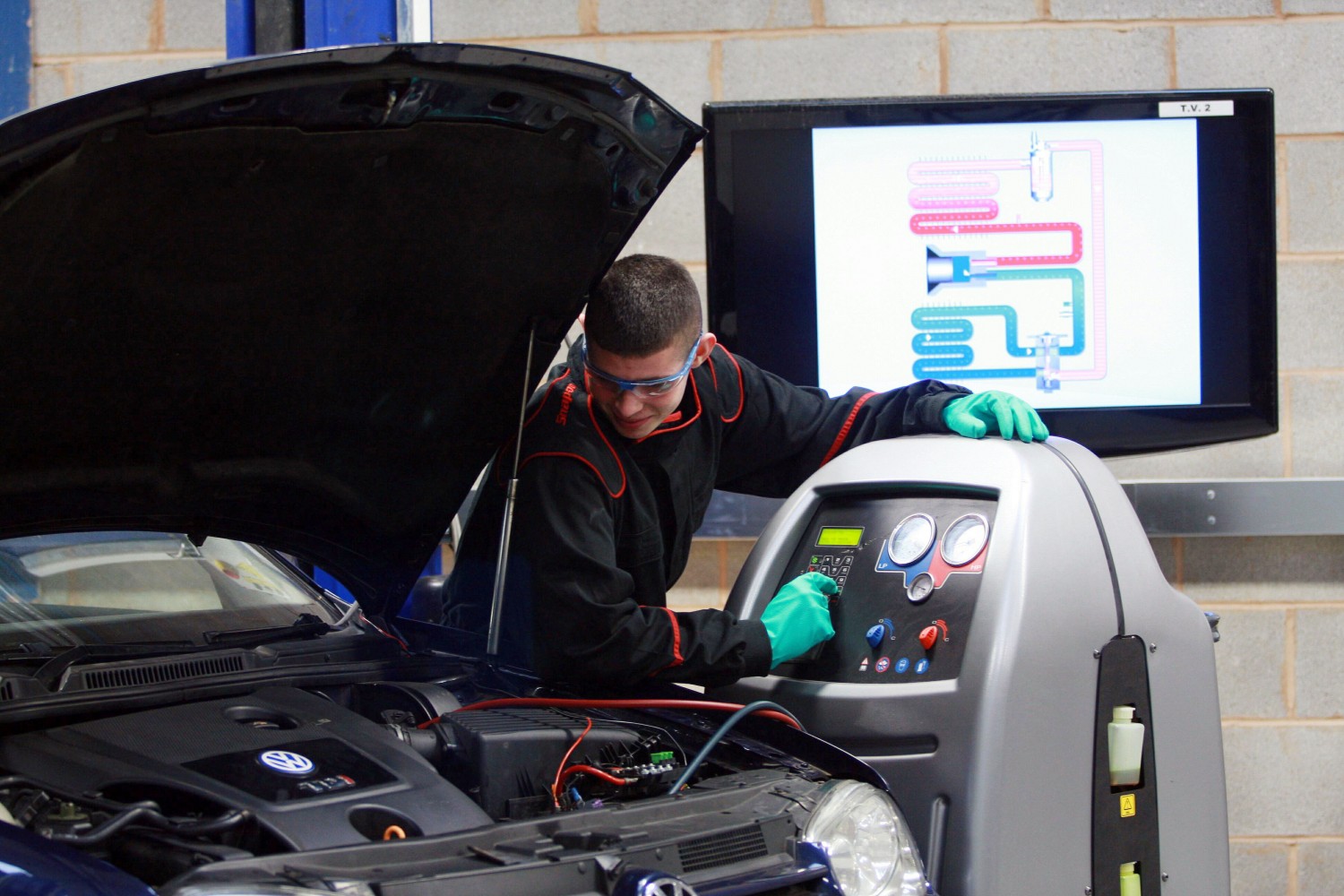 Motor vehicle - student with diagnostics kit 2 - Reaseheath College
