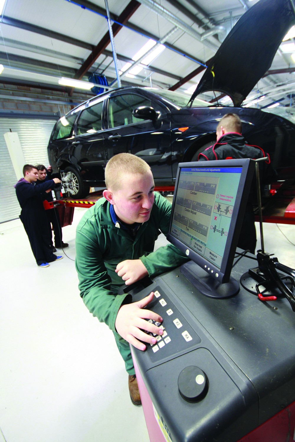 Motor vehicle - student with diagnostics kit 3 - Reaseheath College