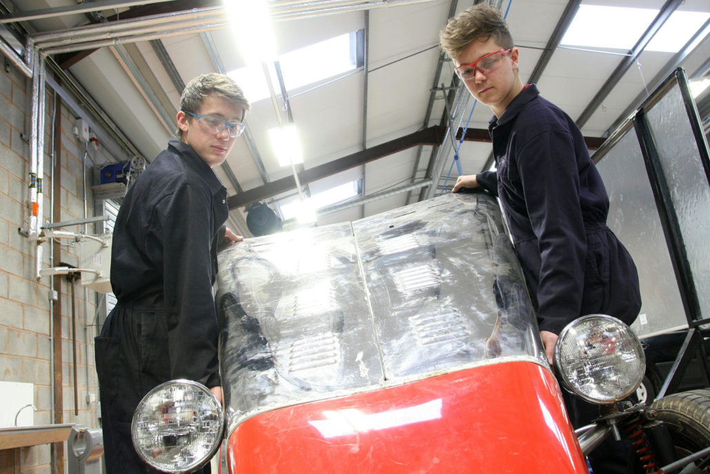 Motor vehicle - students with old car - Reaseheath College