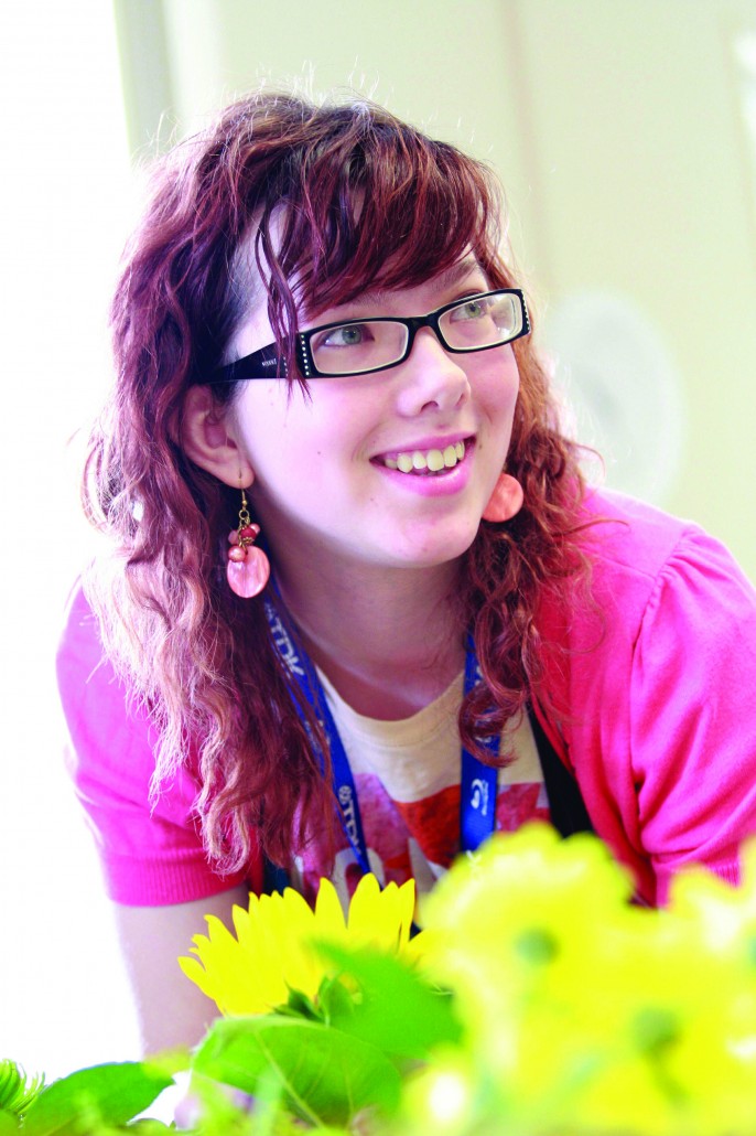 Floristry - student with creation 1 - Reaseheath College