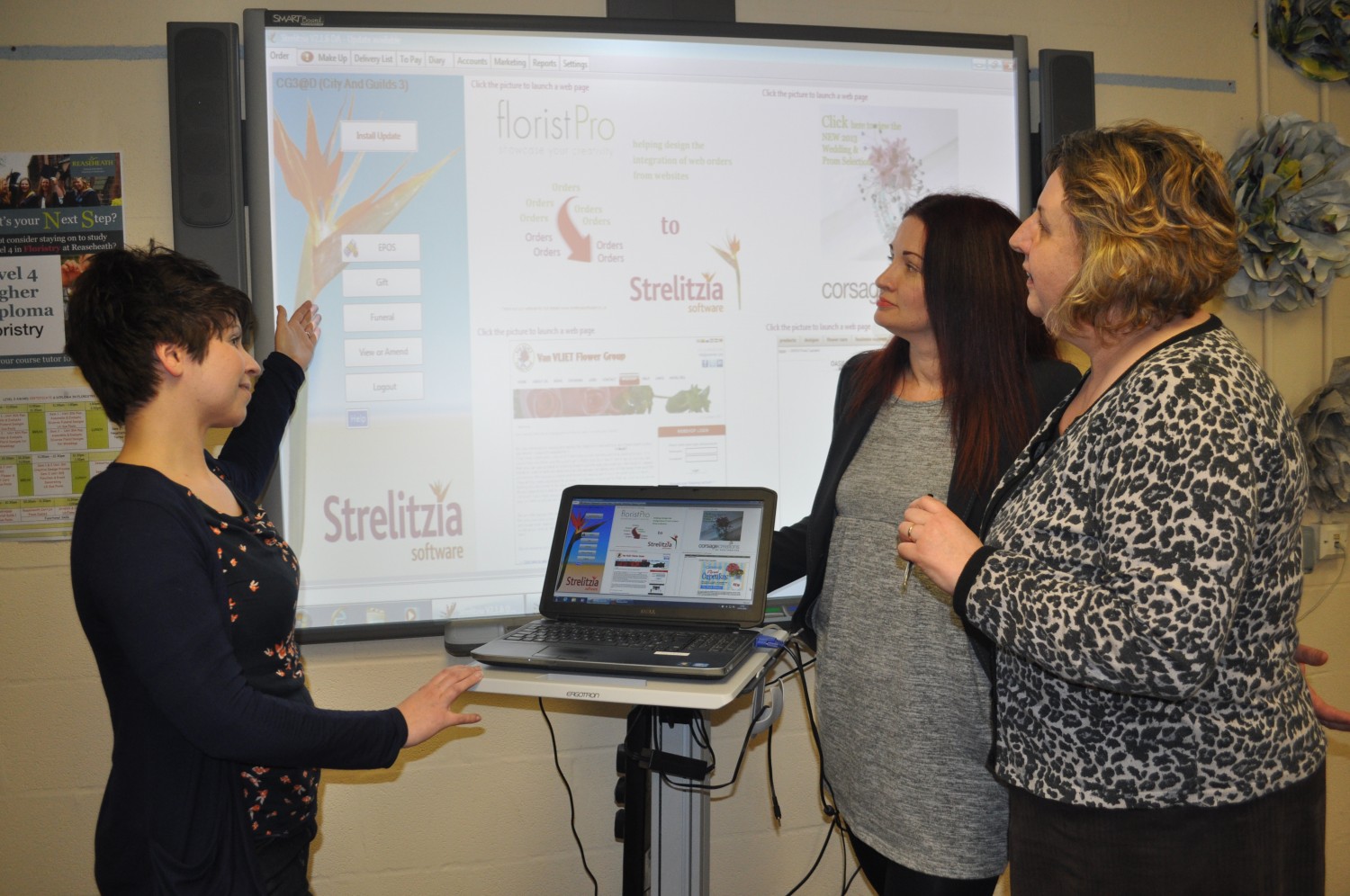 Vicky Venn demonstrates Strelitzia to Sue Poole and Fiona Davies ...