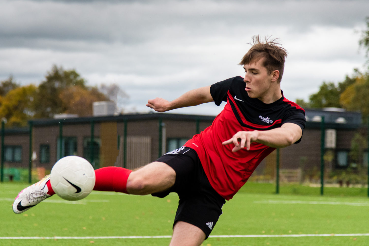 Student Kicking Football (1) - Reaseheath College