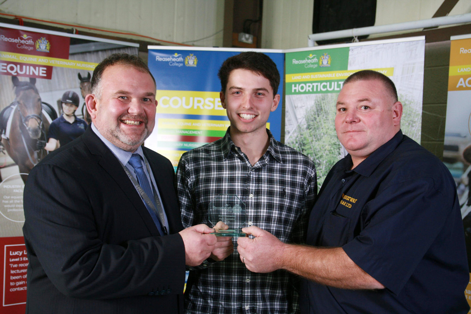 Alex Harley, best plant maintenance apprentice, with assessor Trevor Palmer and boss Wrightway ...