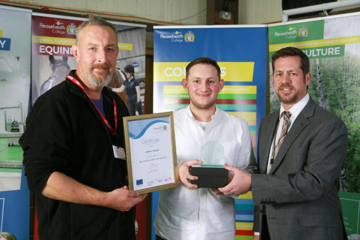 Best apprentice bench joiner Andrew Sharpes with sponsor Craig Hallworth and assessor Andy ...