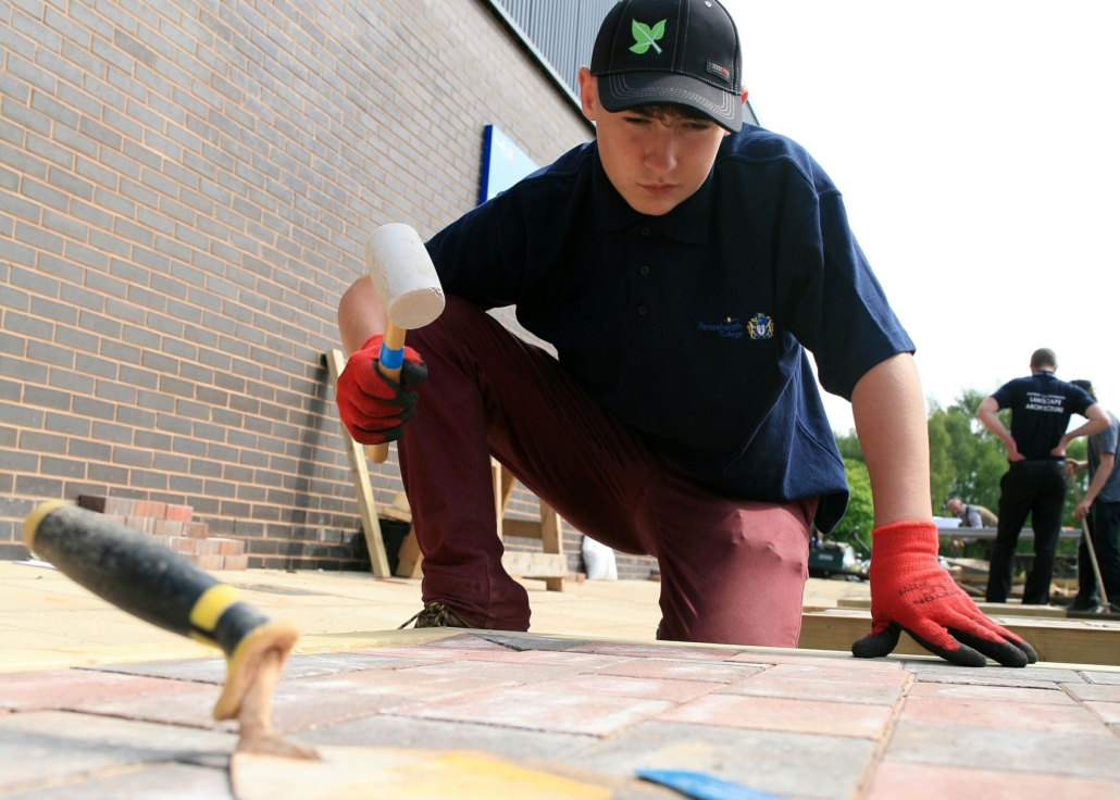 Horticulture - student laying paving slabs - Reaseheath College