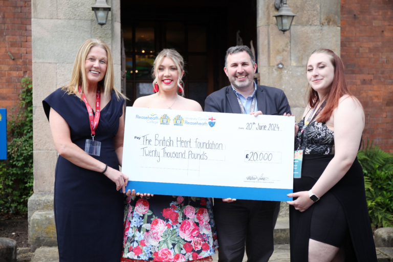 RAG cheque handover BHF's Hayley Gough, RAG Chair Sophie Connor, Senior Assistant Principal Paul ...