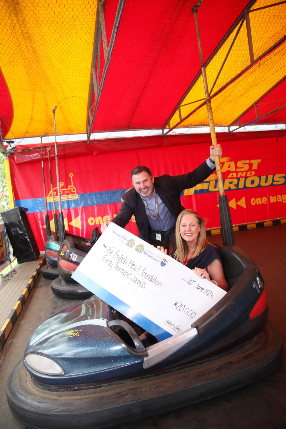 RAG cheque handover BHF's Hayley Gough, Senior Assistant Princiapl Paul Spearritt - Reaseheath ...